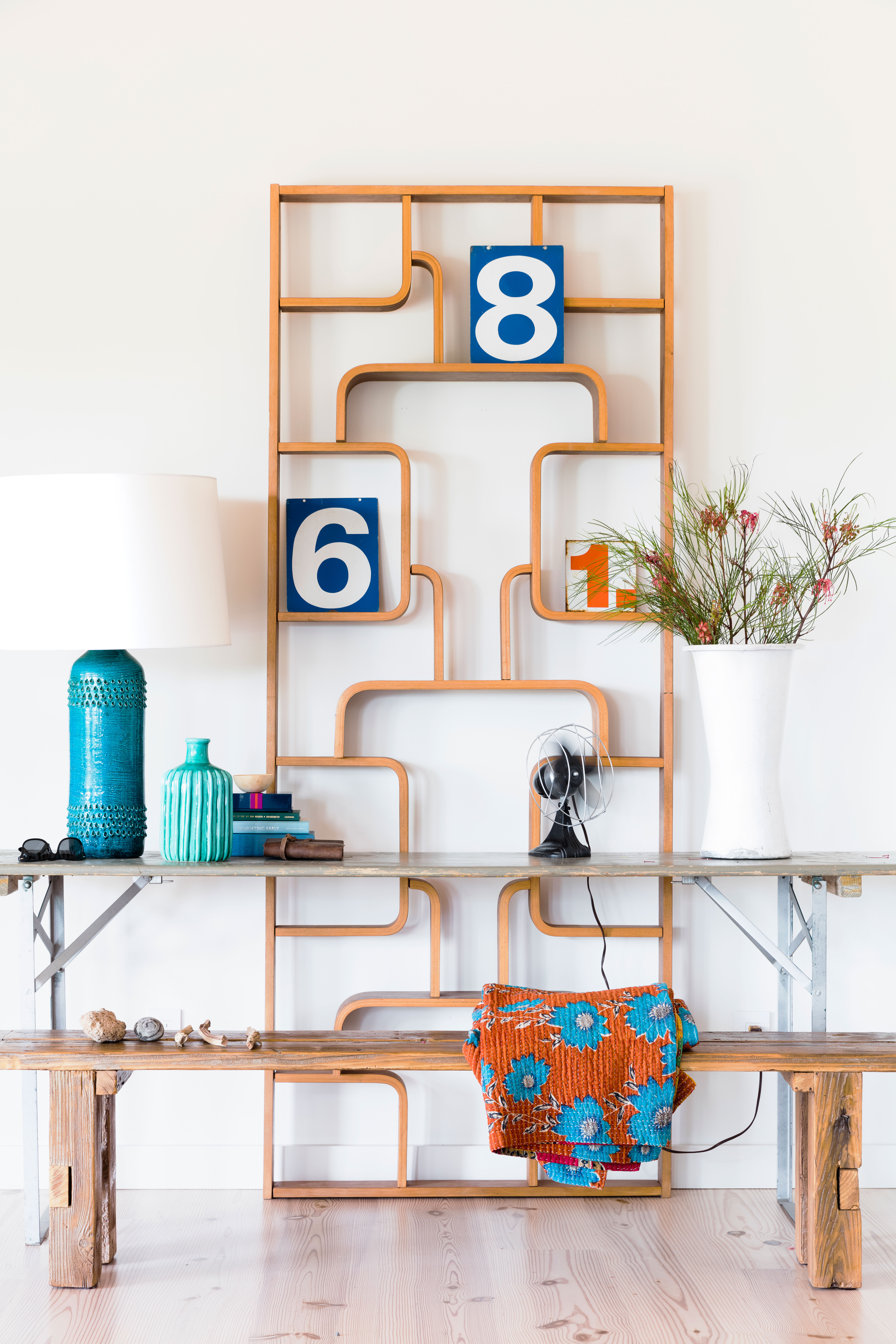 White paint, bright accents, and a whole lot of windows helped a ...